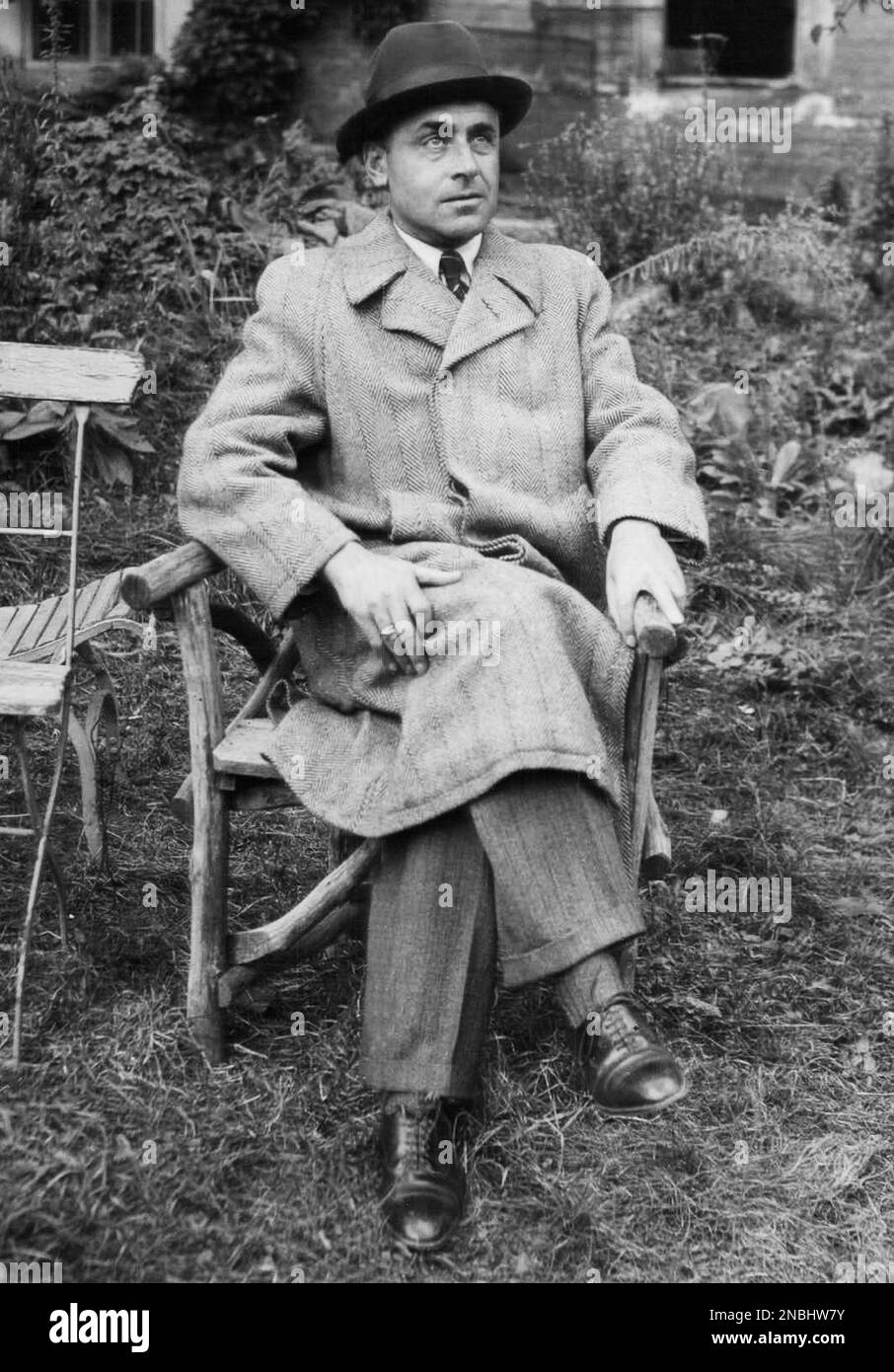 Major General Walter Warlimont wearing civilian clothes taking it easy ...