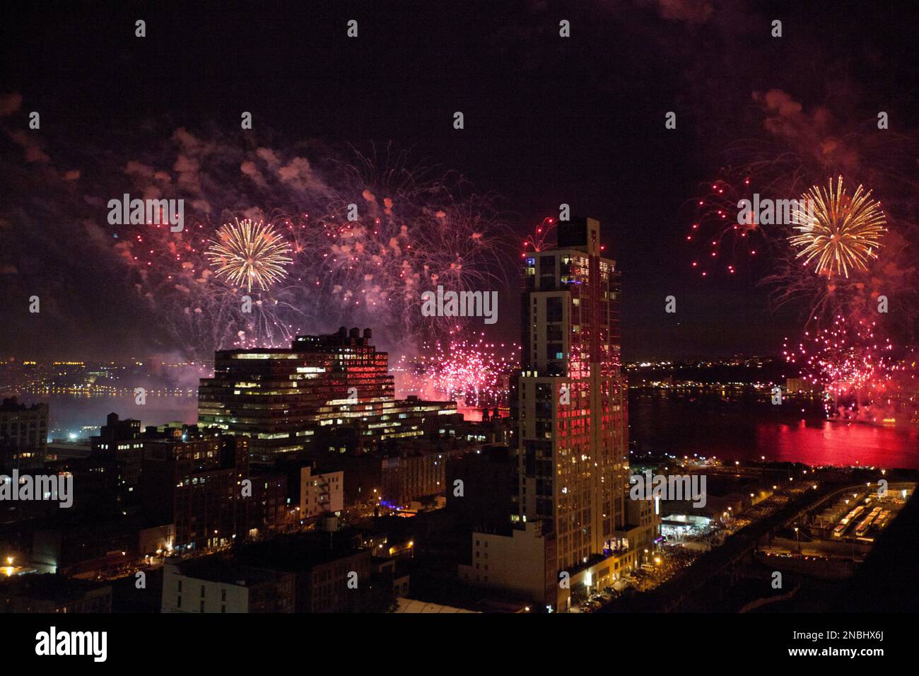 Independence Day fireworks illuminate the sky over the Hudson River and ...
