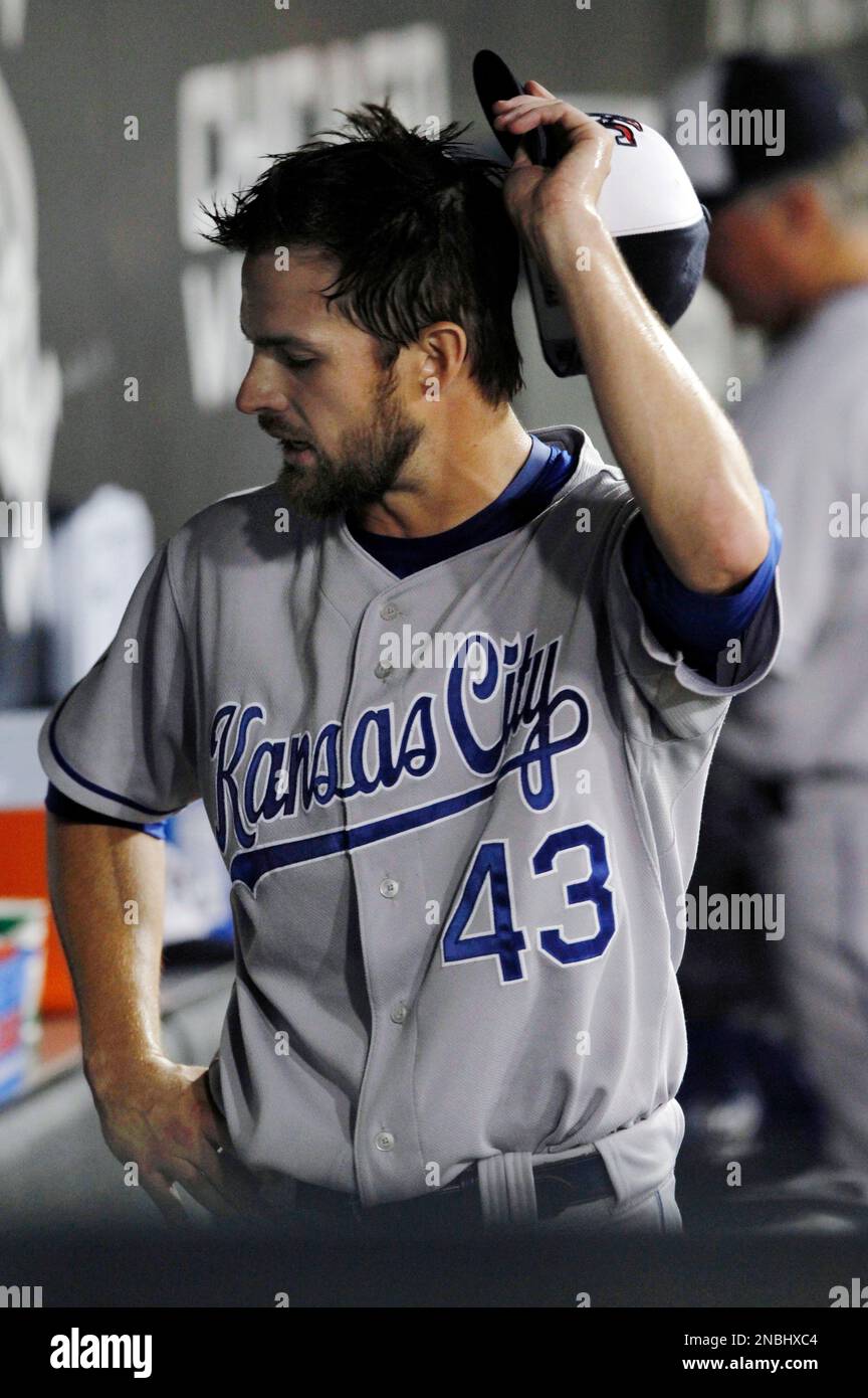 Kansas City Royals relief pitcher Aaron Crow throws his hat after his ...