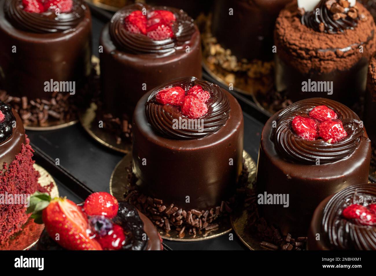 Types of cakes. Delicious cakes in bulk at the patisserie counter ...