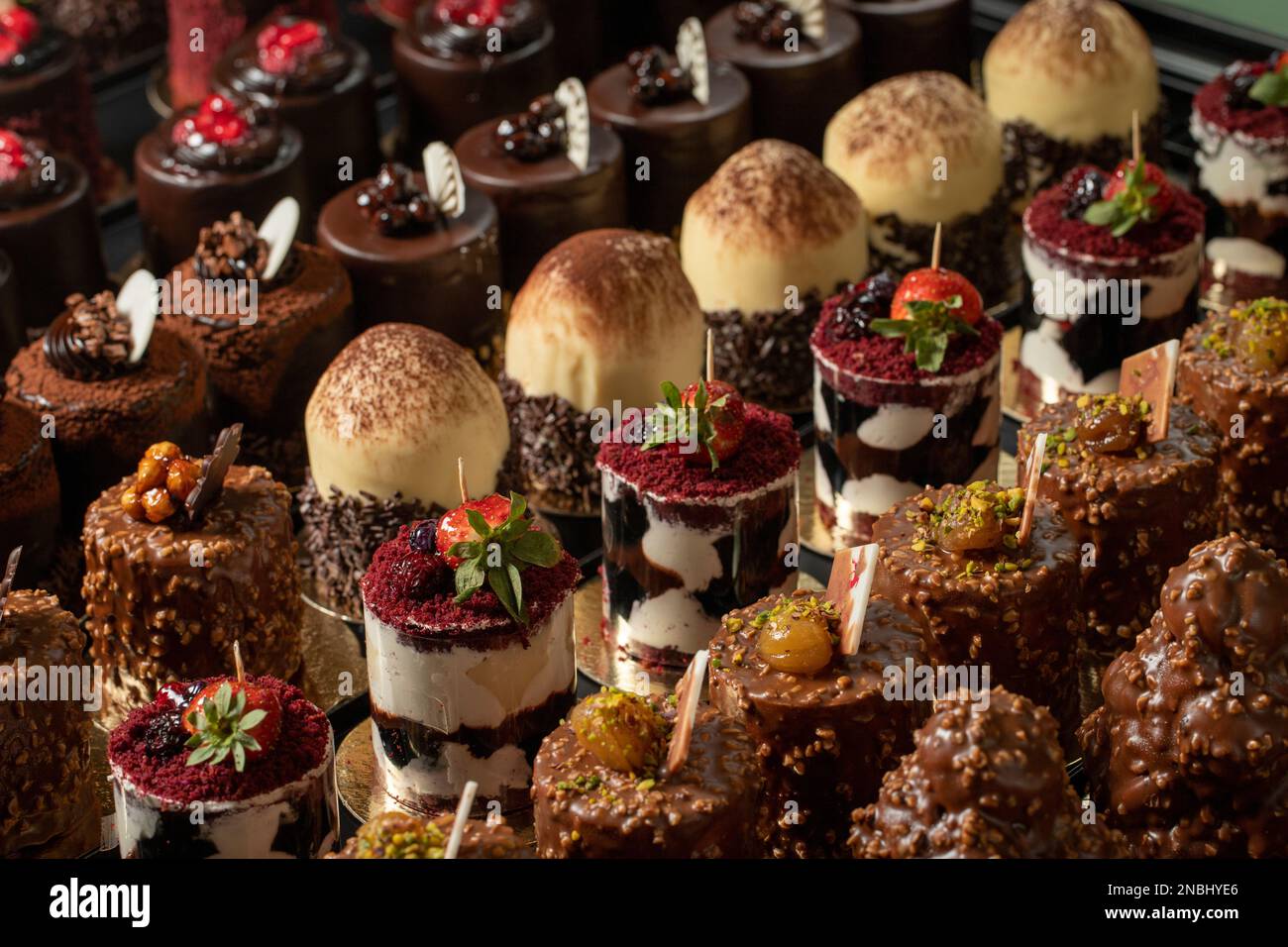 Types of cakes. Delicious cakes in bulk at the patisserie counter ...