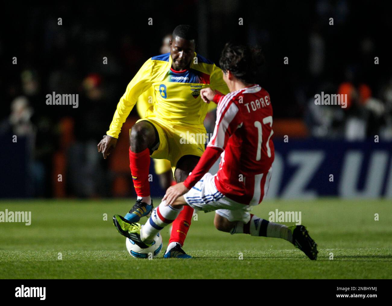 Ecuador's Edison Mendez, left, and Paraguay's Aureliano Torres during a ...