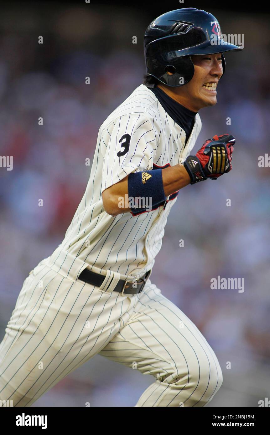 Minnesota Twins Tsuyoshi Nishioka runs during a baseball game against ...