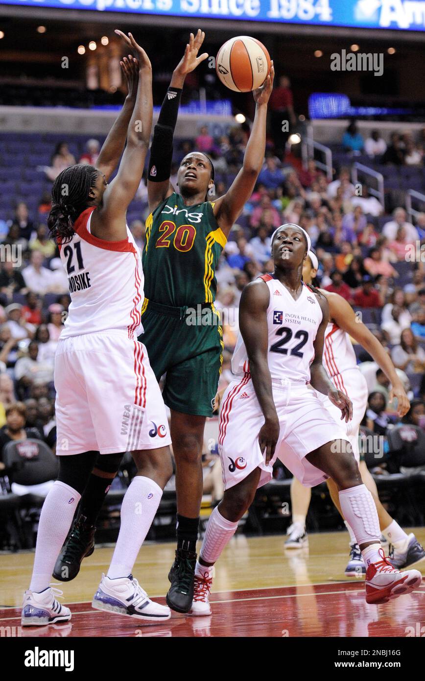Seattle Storm's Camille Little (20) goes to the basket against ...