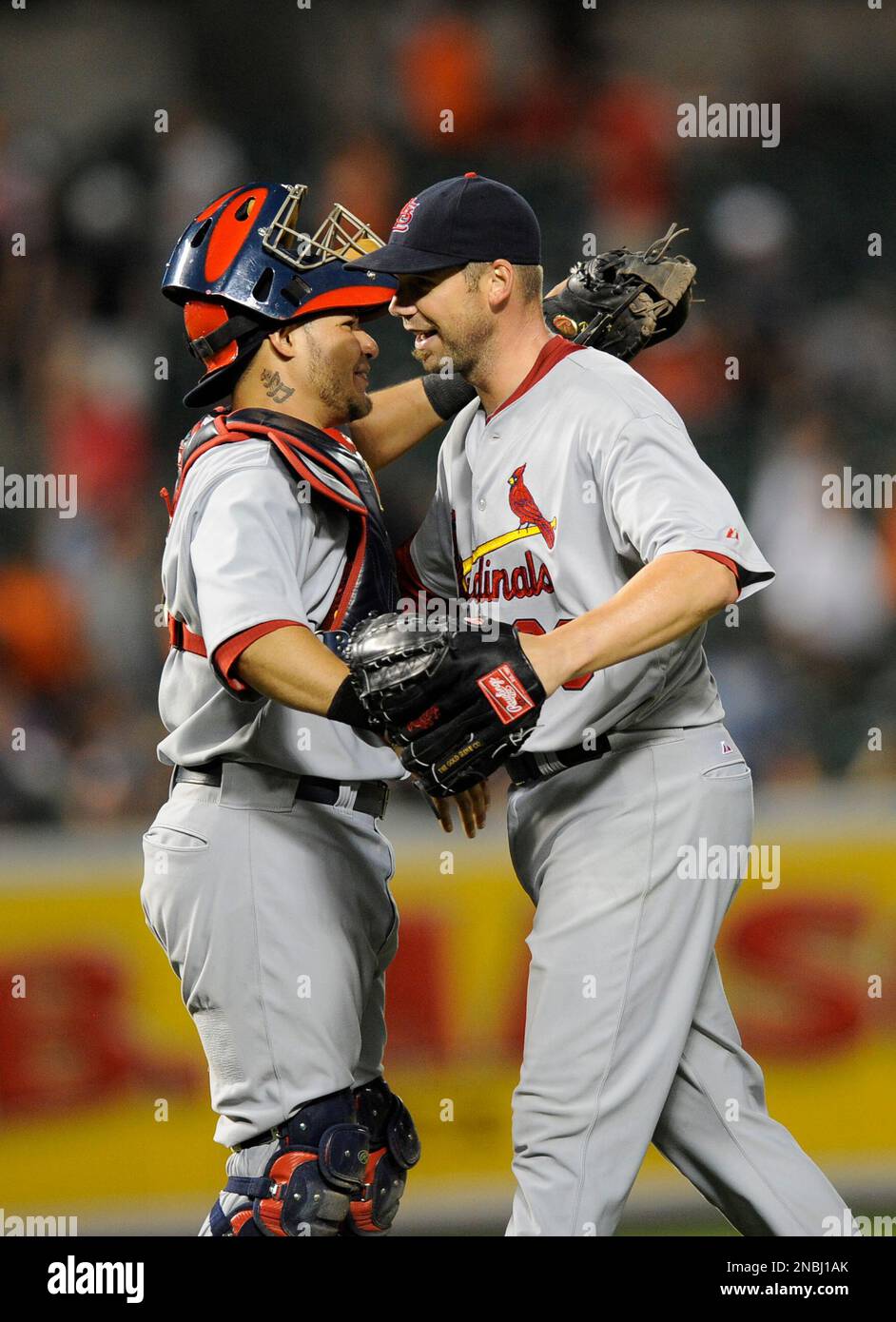 St. Louis Cardinals starting pitcher Chris Carpenter, right, and catcher Yadier Molina, left ...