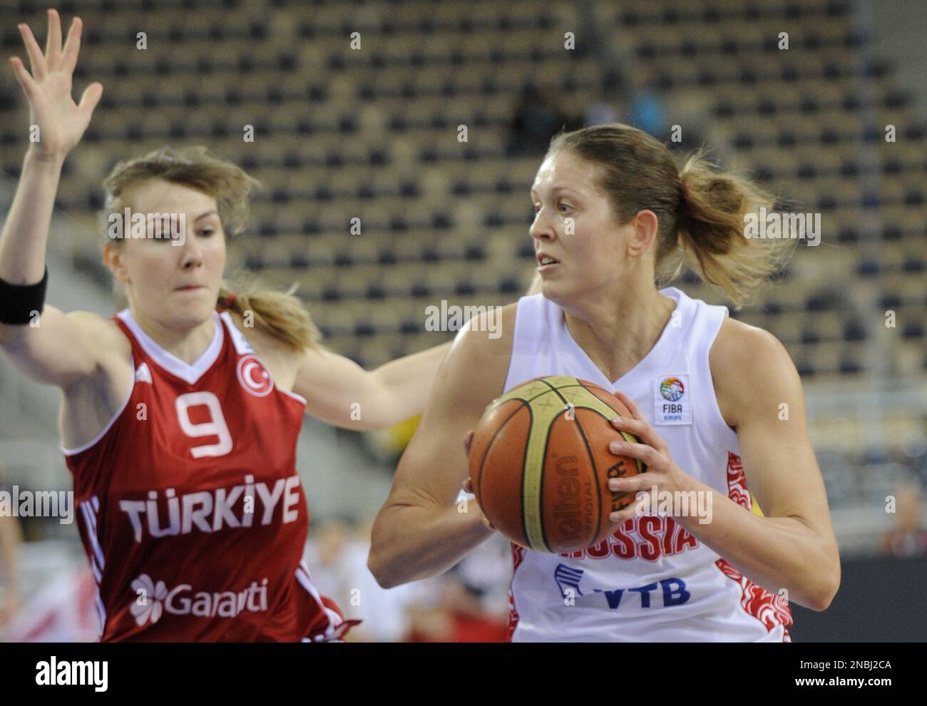 Russia's Olga Arteshina, right, challanges Turkey's Gulsah Akkaya ...