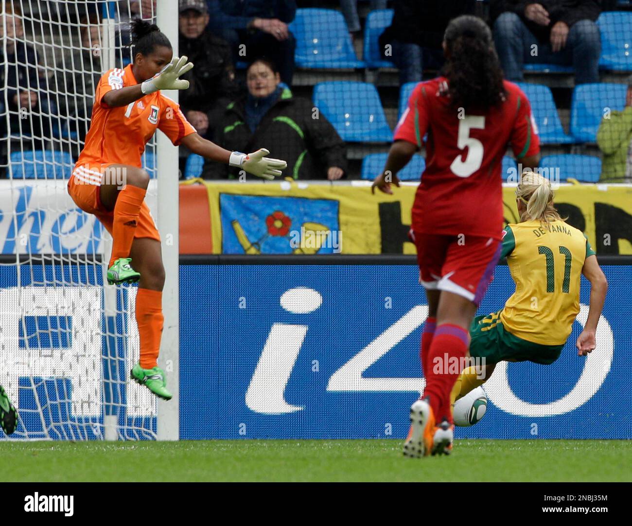 Australia's Lisa De Vanna, right scores her side's third goal past ...