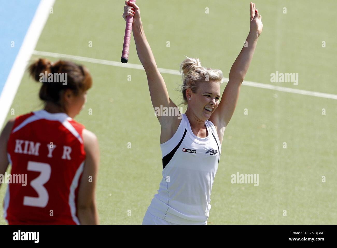 Charlotte Harrison of New Zealand, right, celebrates her winning goal ...
