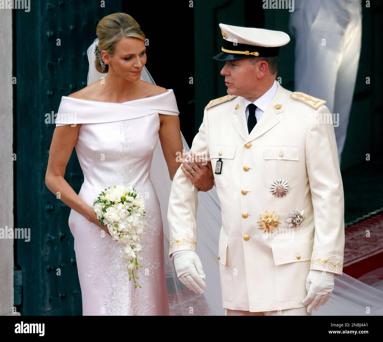 Monaco's Prince Albert II and Princess Charlene leave after the ...