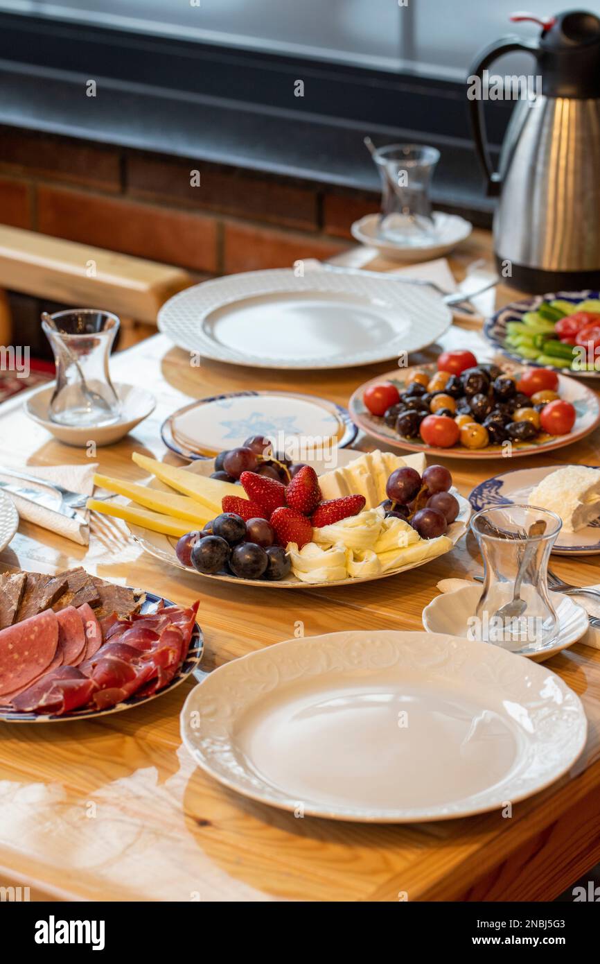 Ramadan table. The sahur table with cheese varieties, salami, pastrami ...