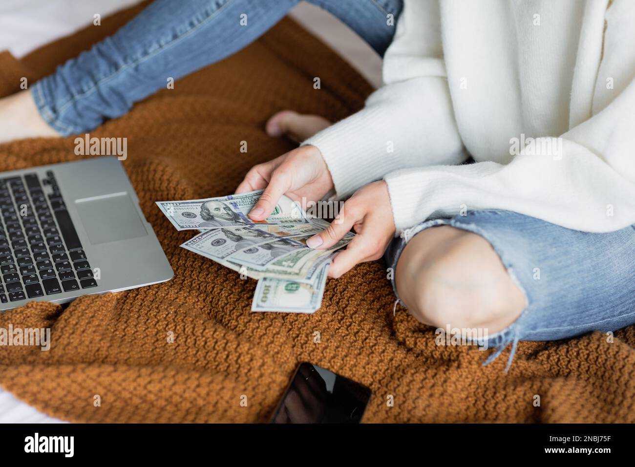 Young caucasian woman holding hands cash money dollars bills. Person ...