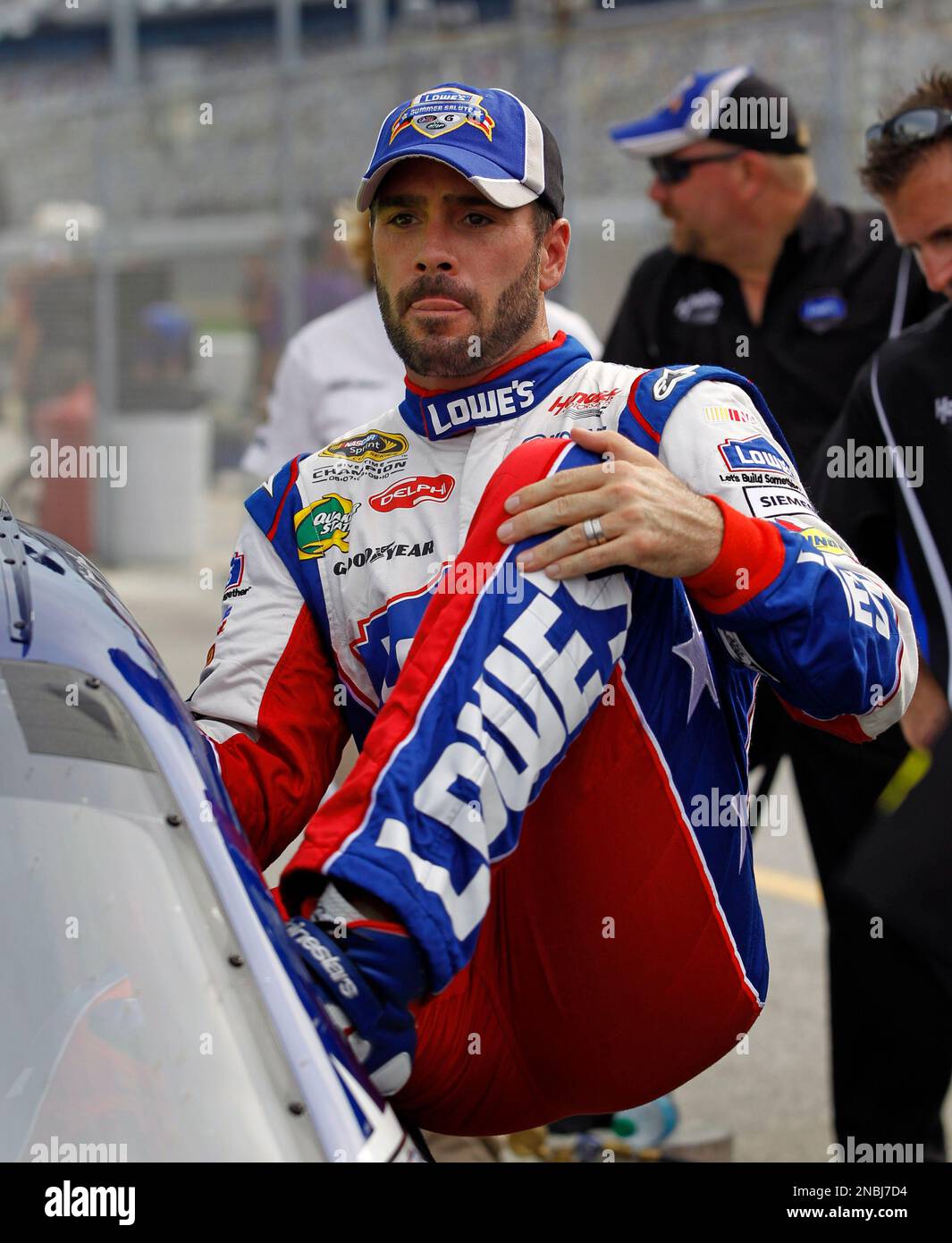 NASCAR driver Jimmie Johnson gets out of his car after his qualifying ...