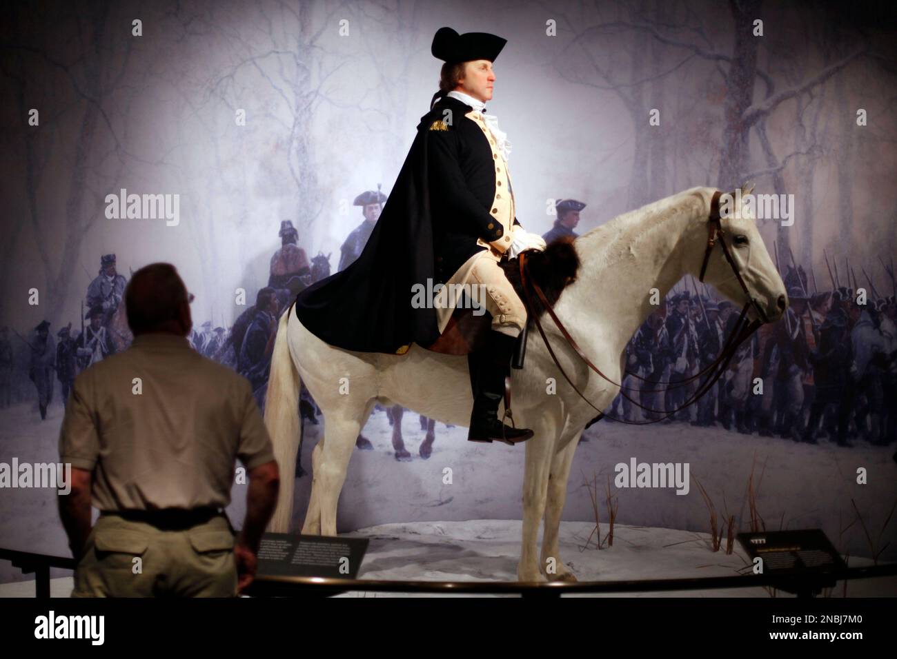 A person views a model depicting George Washington at age 45 at the ...