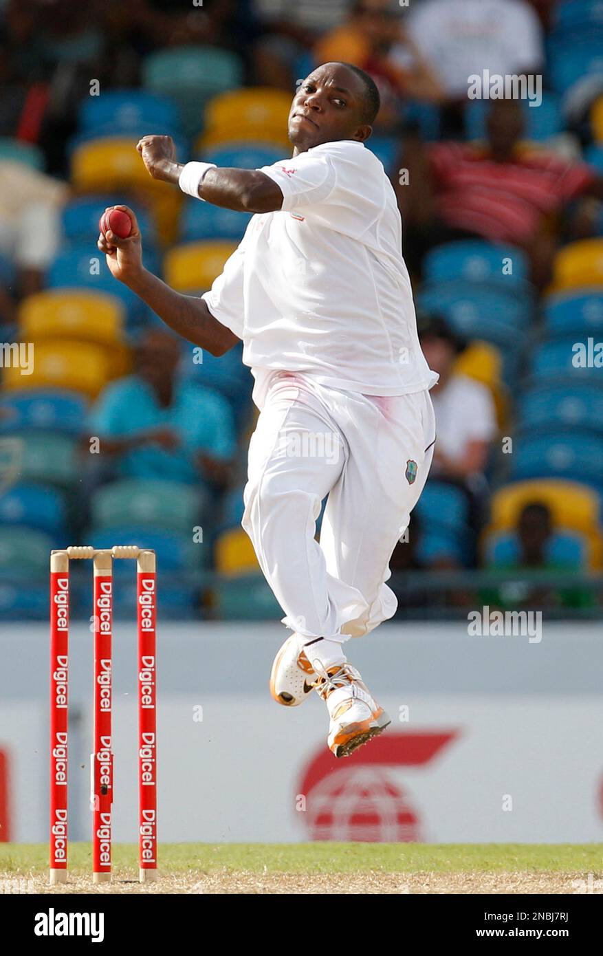 West Indies' bowler Fidel Edwards bowls during the fourth day of the ...