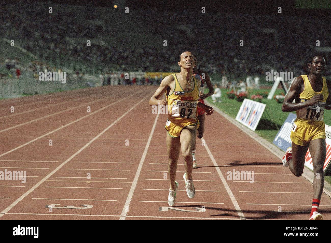 Said Aouita of Morocco crosses the finish line to break his own record ...