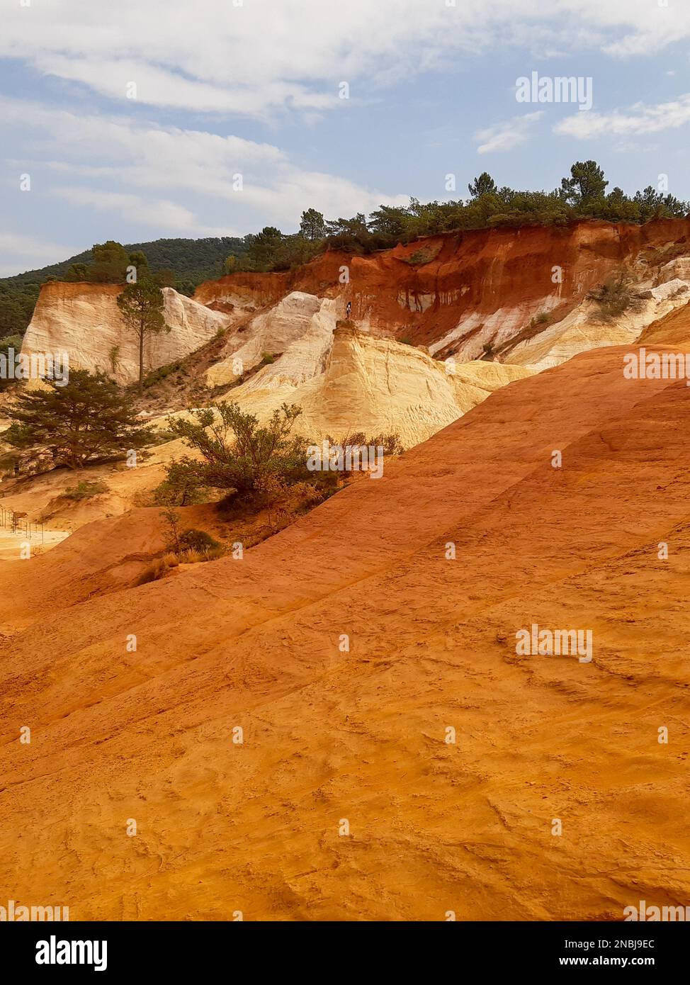 rocks hill of natural ochre in rustrel Roussillon in Luberon Provence ...