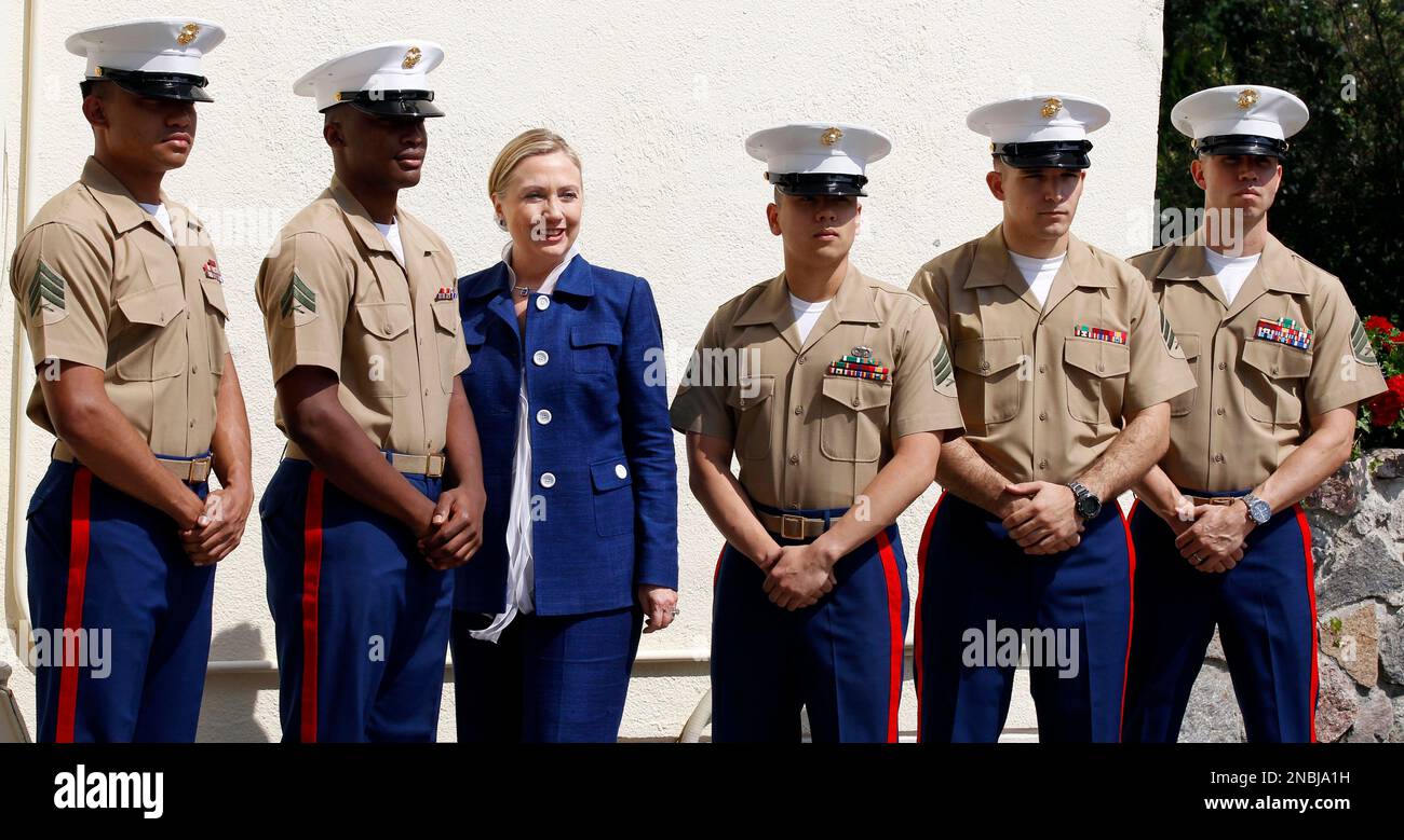 Secretary of State Hillary Rodham Clinton poses for a picture with ...