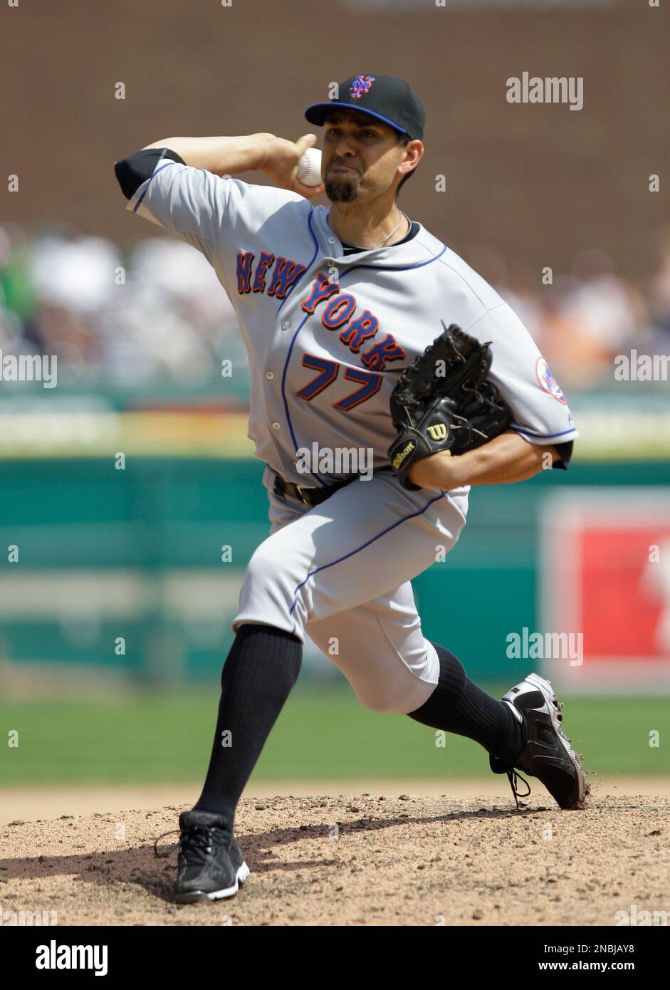 New York Mets relief pitcher D.J. Carrasco (77) throws against the ...