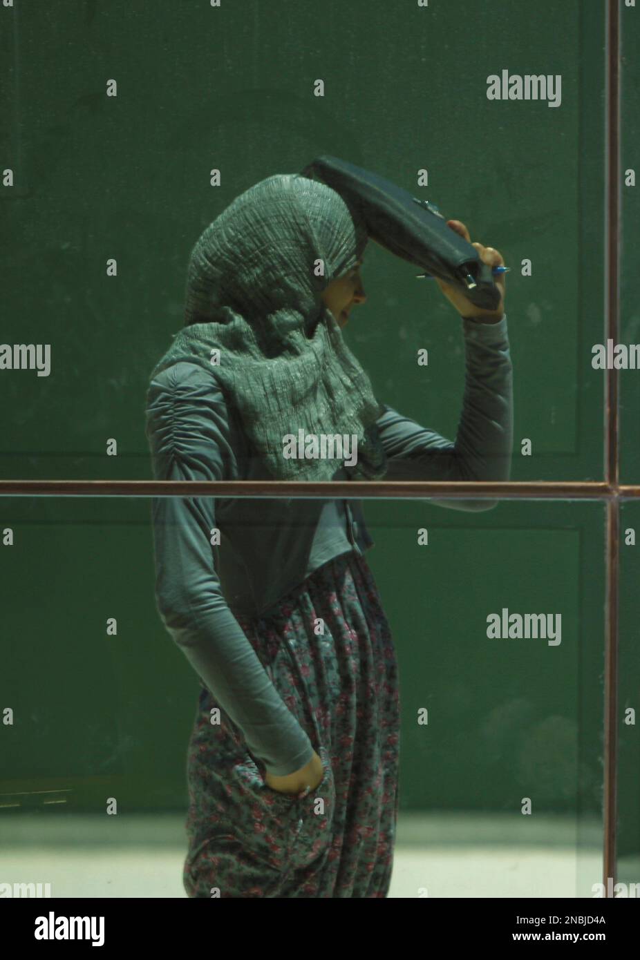 In this photo taken on a government-organized tour, a Libyan student is ...