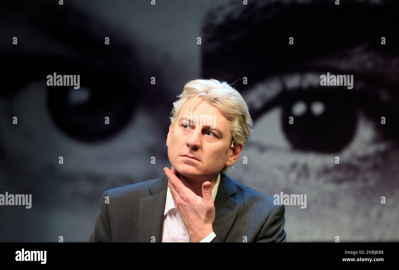 Actor Darren Weller plays Julian Assange during a rehearsal for ...