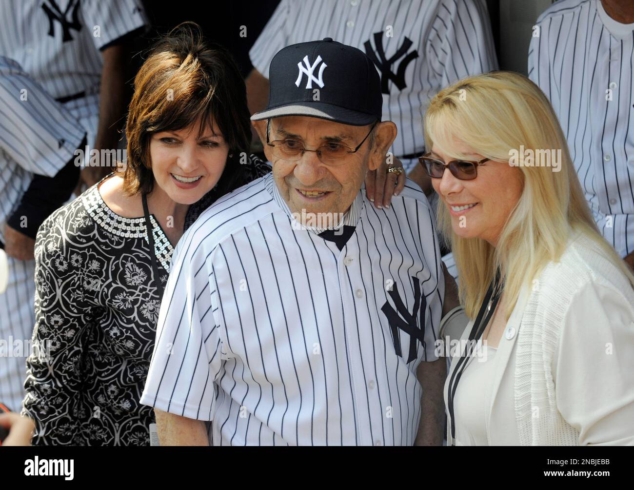 Former New York Yankees catcher Yogi Berra poses with Kay Mercer, left ...