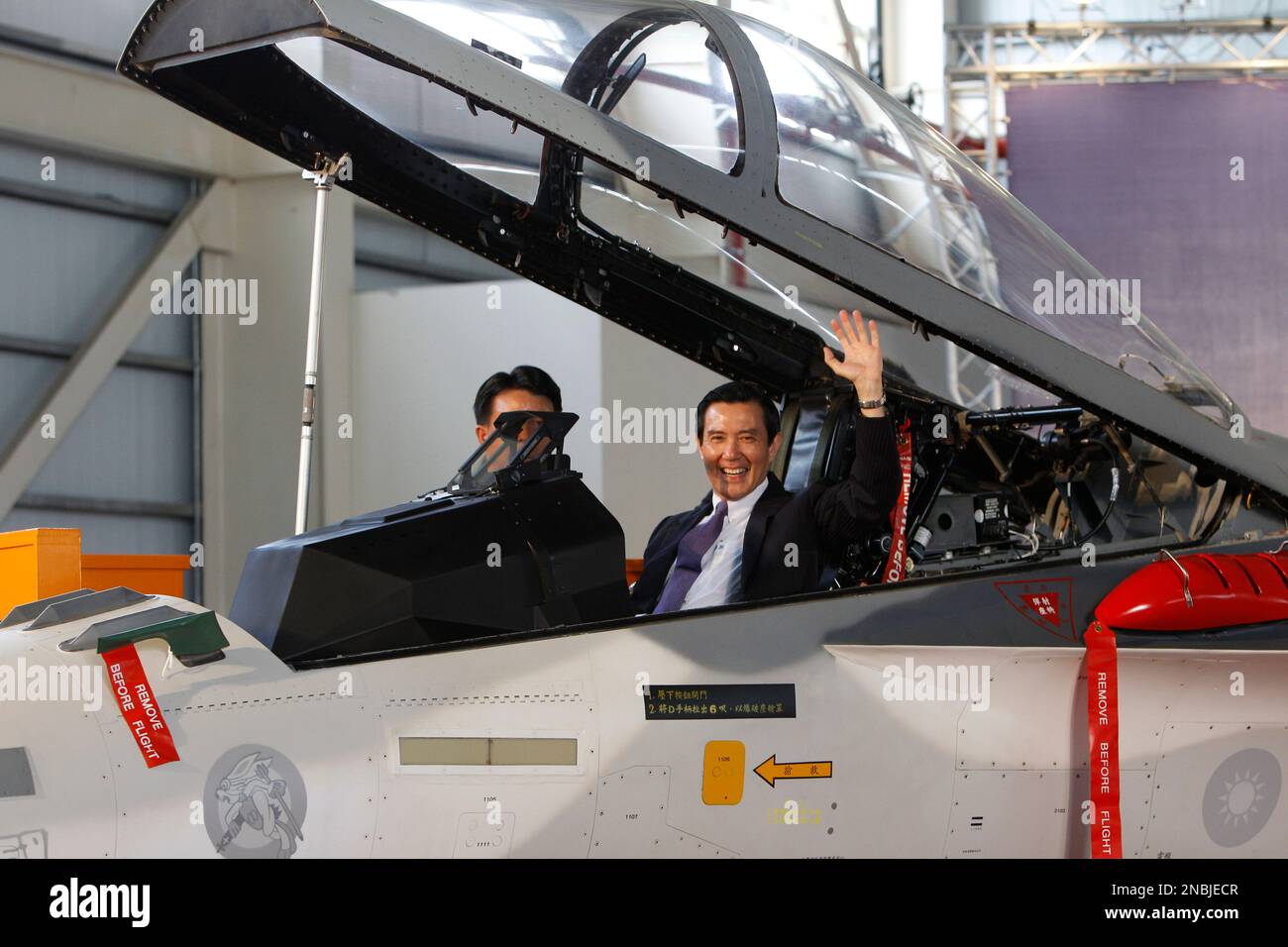 Taiwan's President Ma Ying-jeou waves from the cockpit of the newly ...