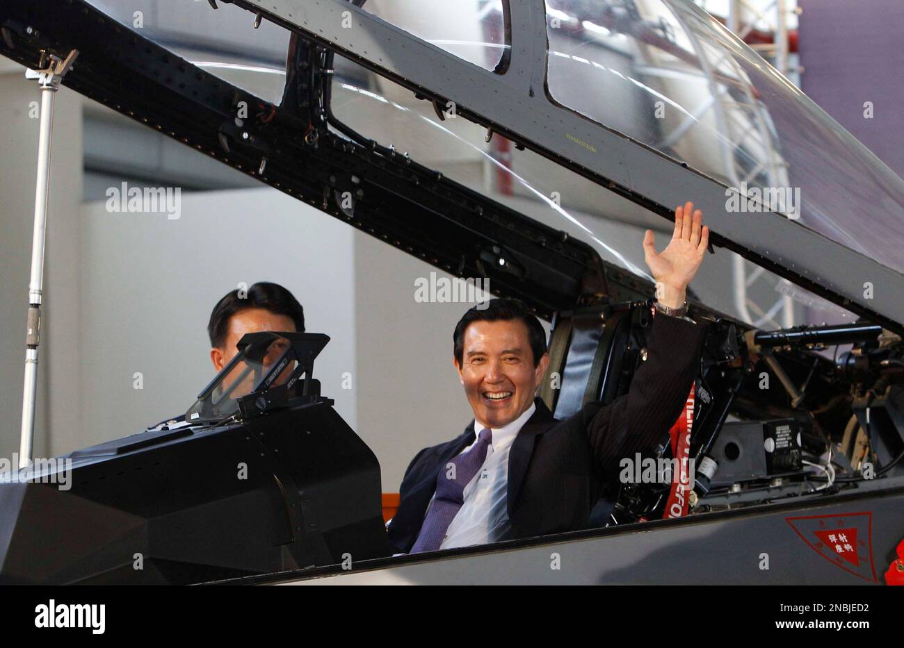 Taiwan's President Ma Ying-jeou waves from the cockpit of the newly ...