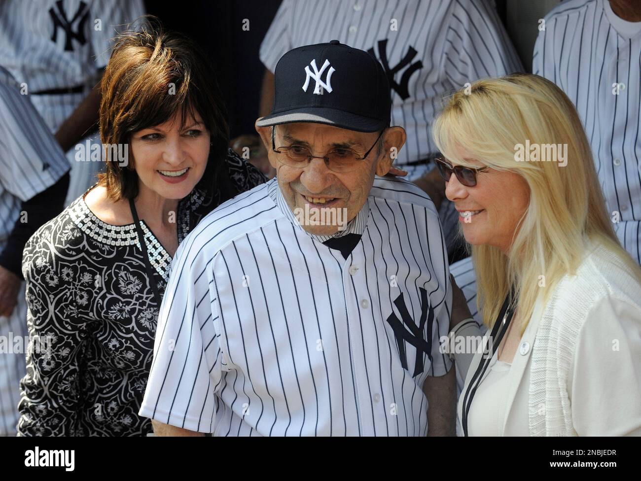 Former New York Yankees catcher Yogi Berra poses with Kay Mercer, left ...