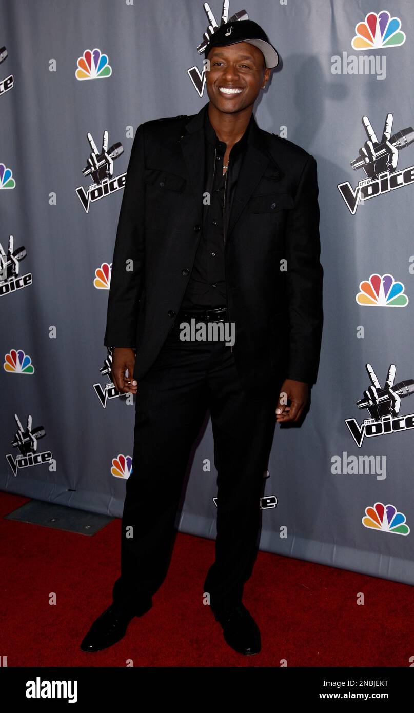 Javier Colon, winner of "The Voice", poses for photographers after ...
