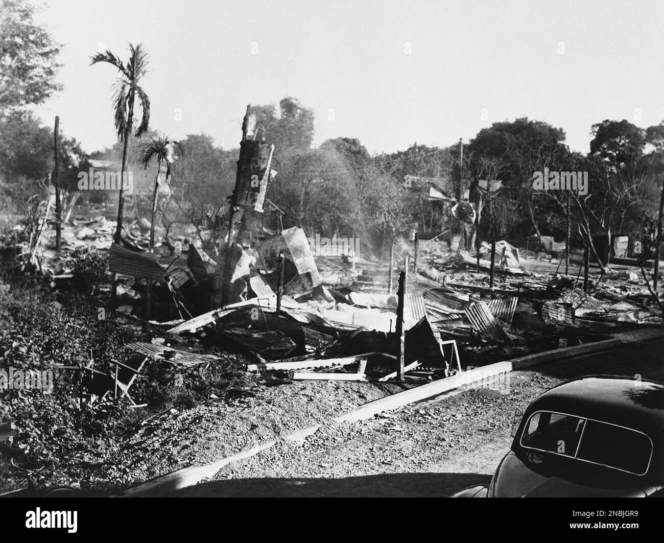 In the first Japanese air raid on Manila, Philippines, these homes on ...