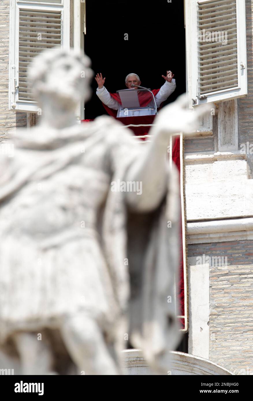Pope Benedict XVI delivers his blessing during the Angelus prayer he ...