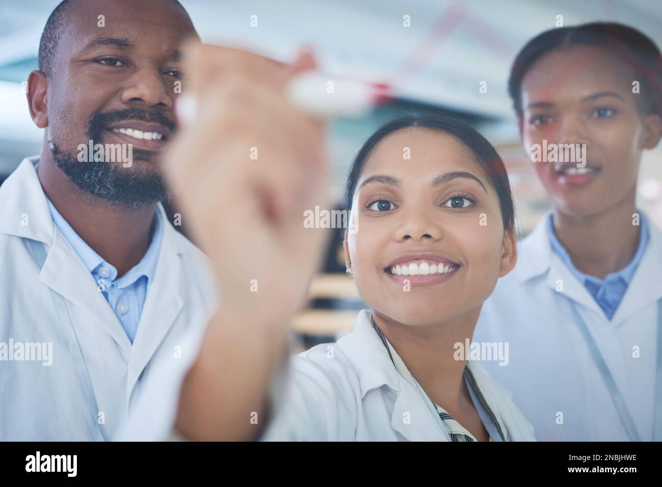 The brilliant minds behind the breakthrough. a group of scientists ...