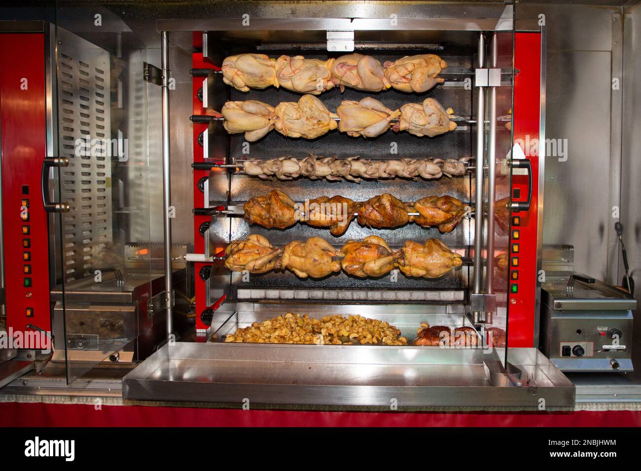 Rotisserie machine hi-res stock photography and images - Alamy