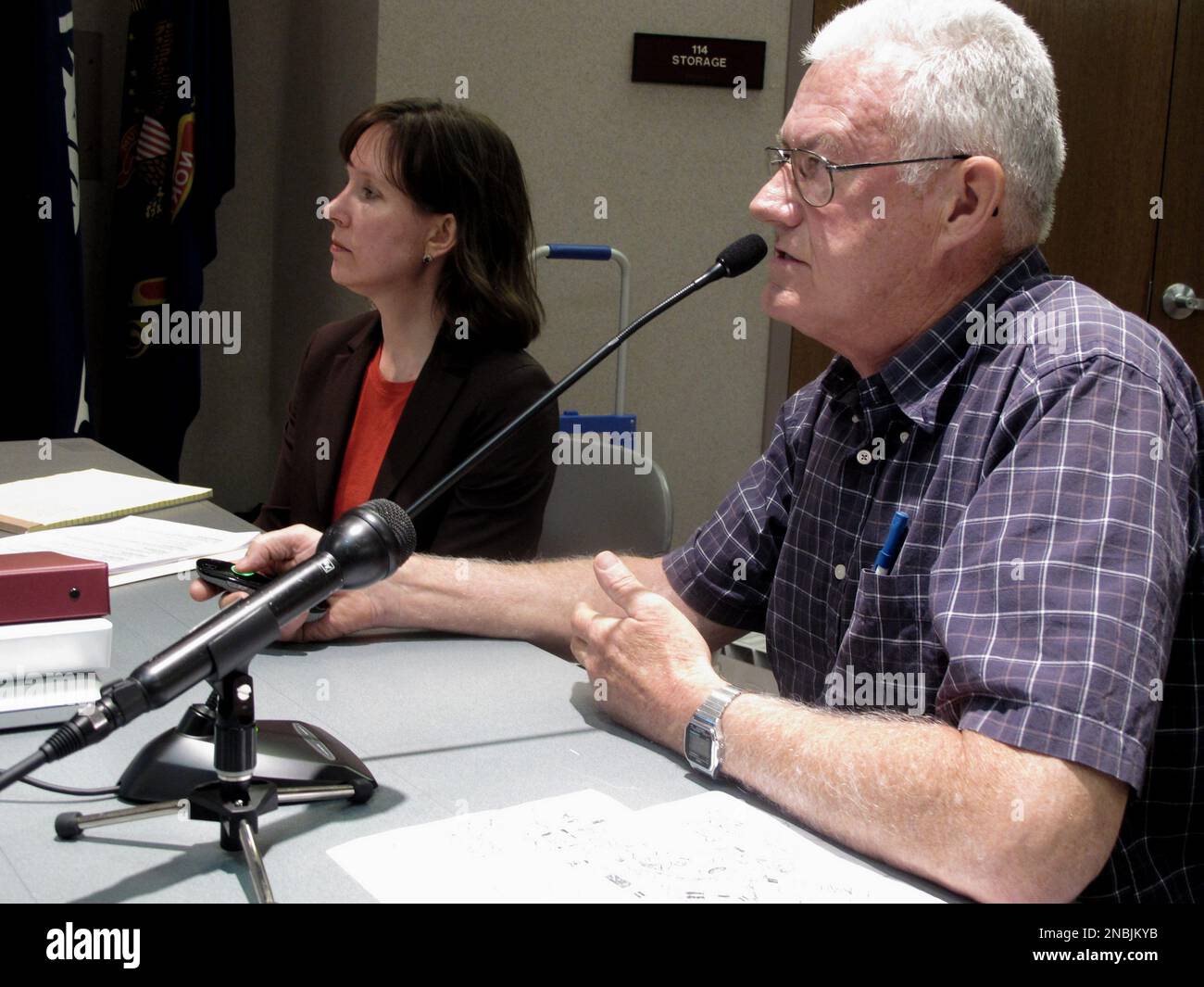 Stephen Merrill, right, a retired soils scientist, describes a map of a ...