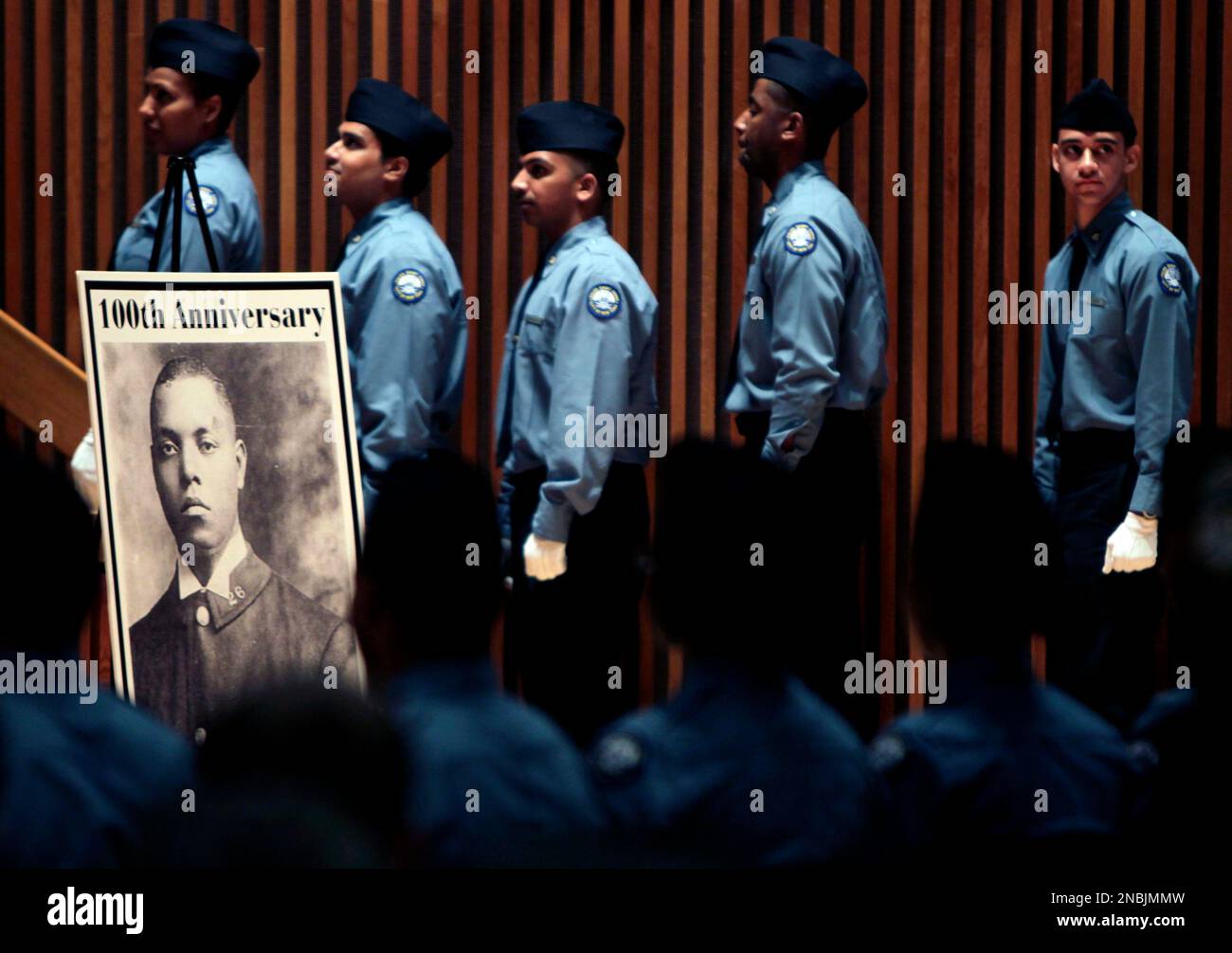 A picture of Samuel Battle is displayed during a graduation ceremony ...