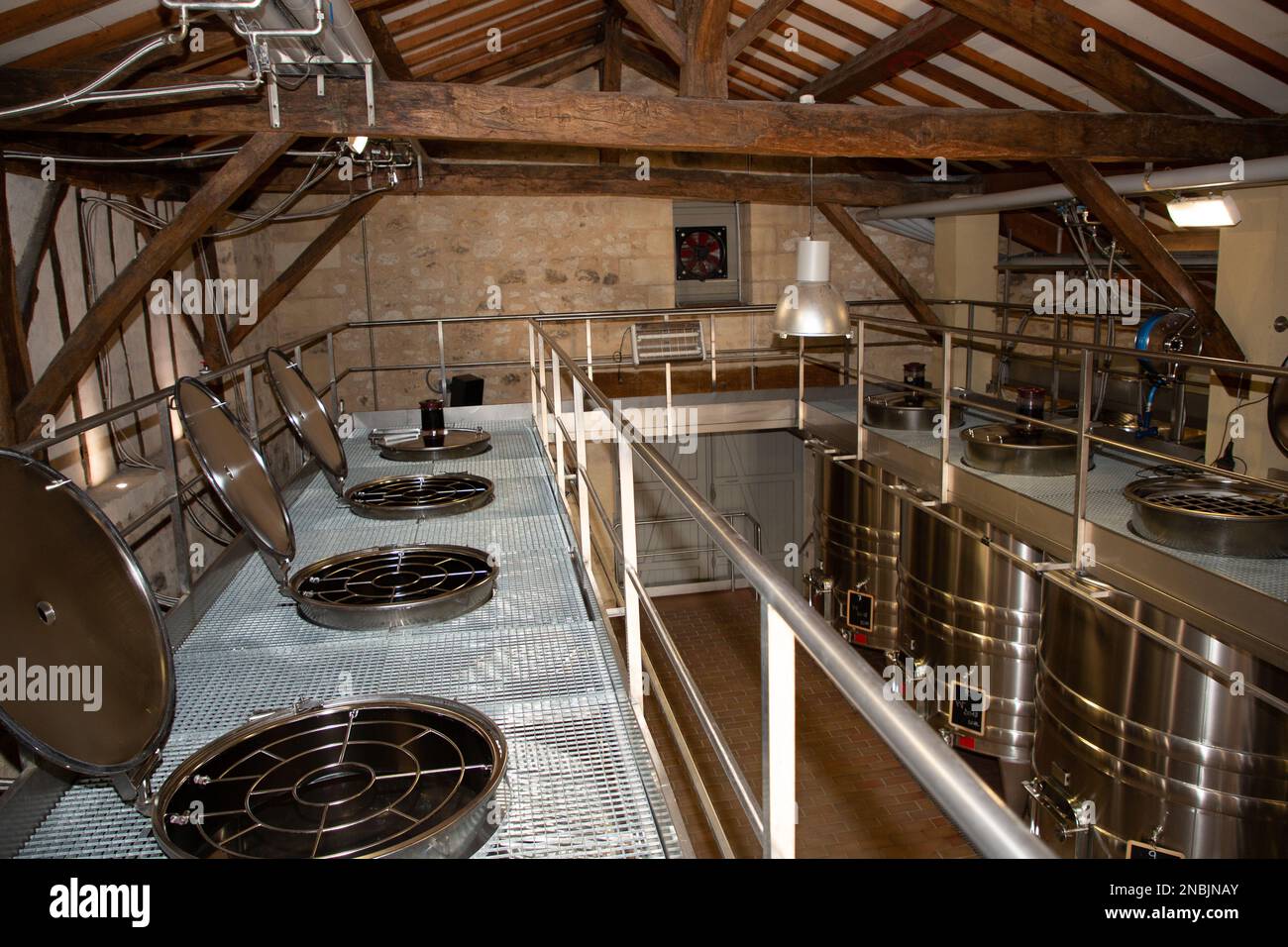 Modern wine factory with new large tanks for the fermentation. modern ...