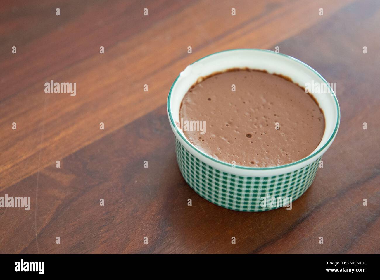 Melted chocolate mousse swirl cocoa dessert in pot Stock Photo - Alamy