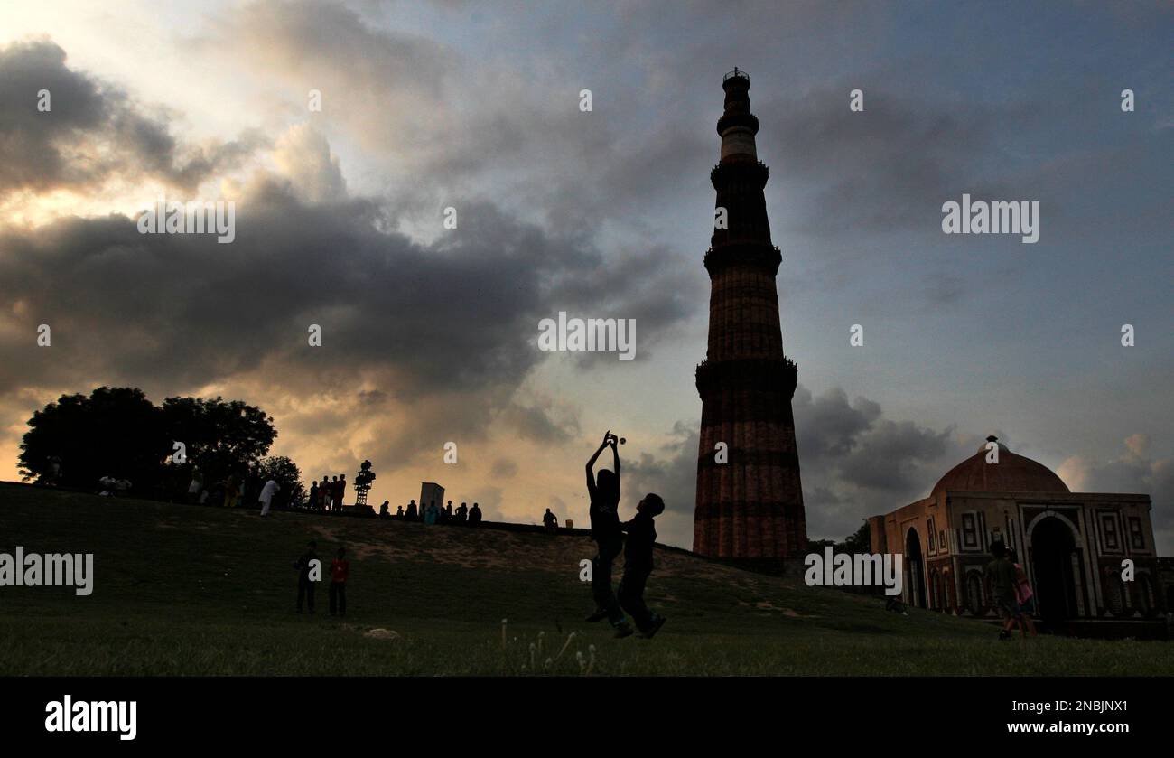 Children play in the premises of the 12th-century Qutub Minar World ...