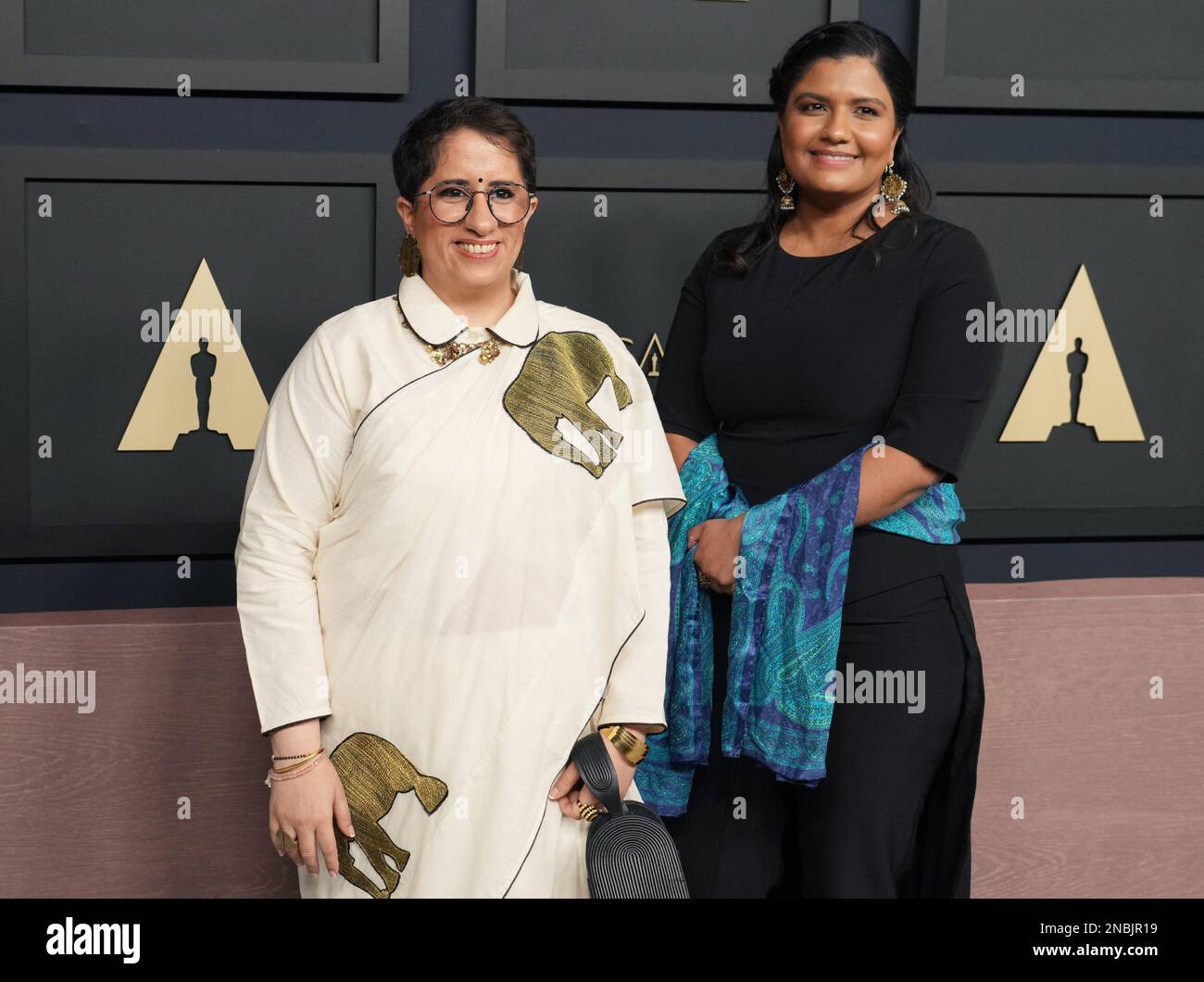 Los Angeles, USA. 13th Feb, 2023. (L-R) Guneet Monga and Kartiki ...