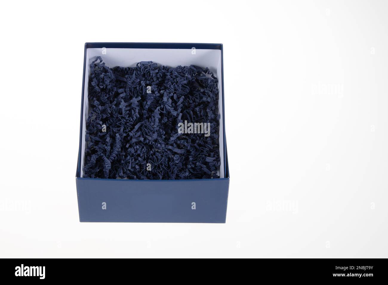 straw blue packing wood shavings chips fiber wooden thin paper open box ...