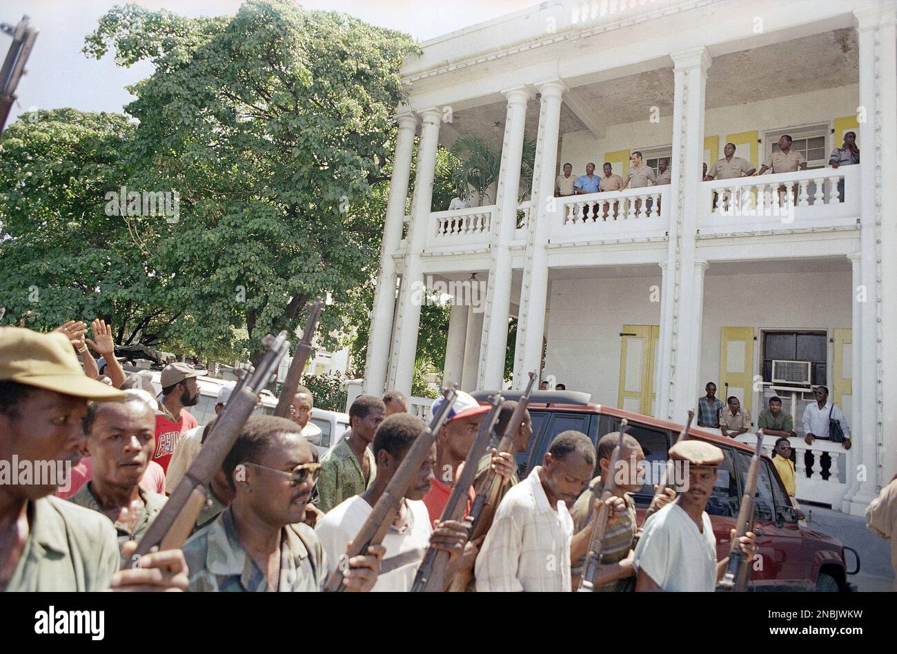 Haitian paramilitary recruits parade in front of military headquarters ...