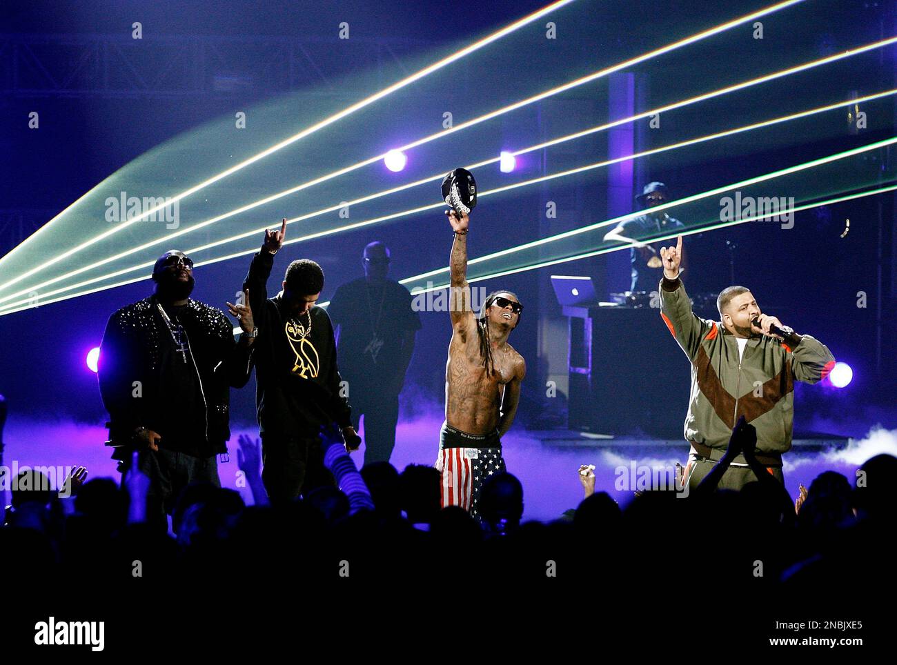 From left, Rick Ross, Drake, Lil Wayne, and DJ Khaled perform at the ...