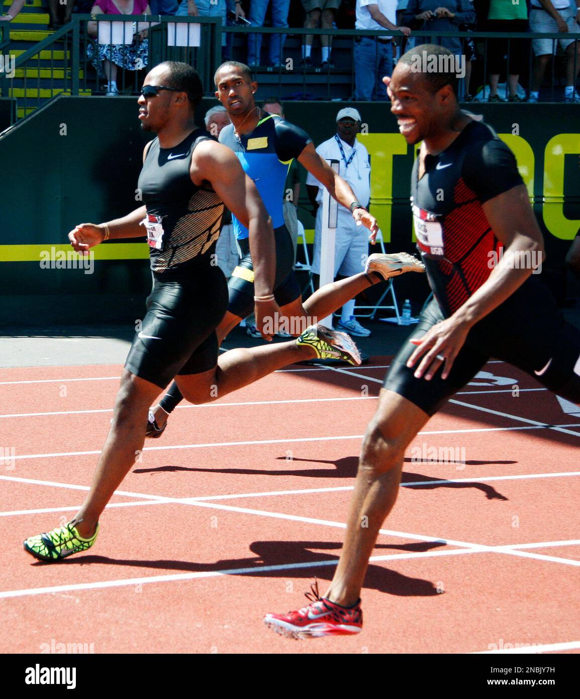 Walter Dix, left, wins the men's 200 meters ahead of Darvis Patton ...