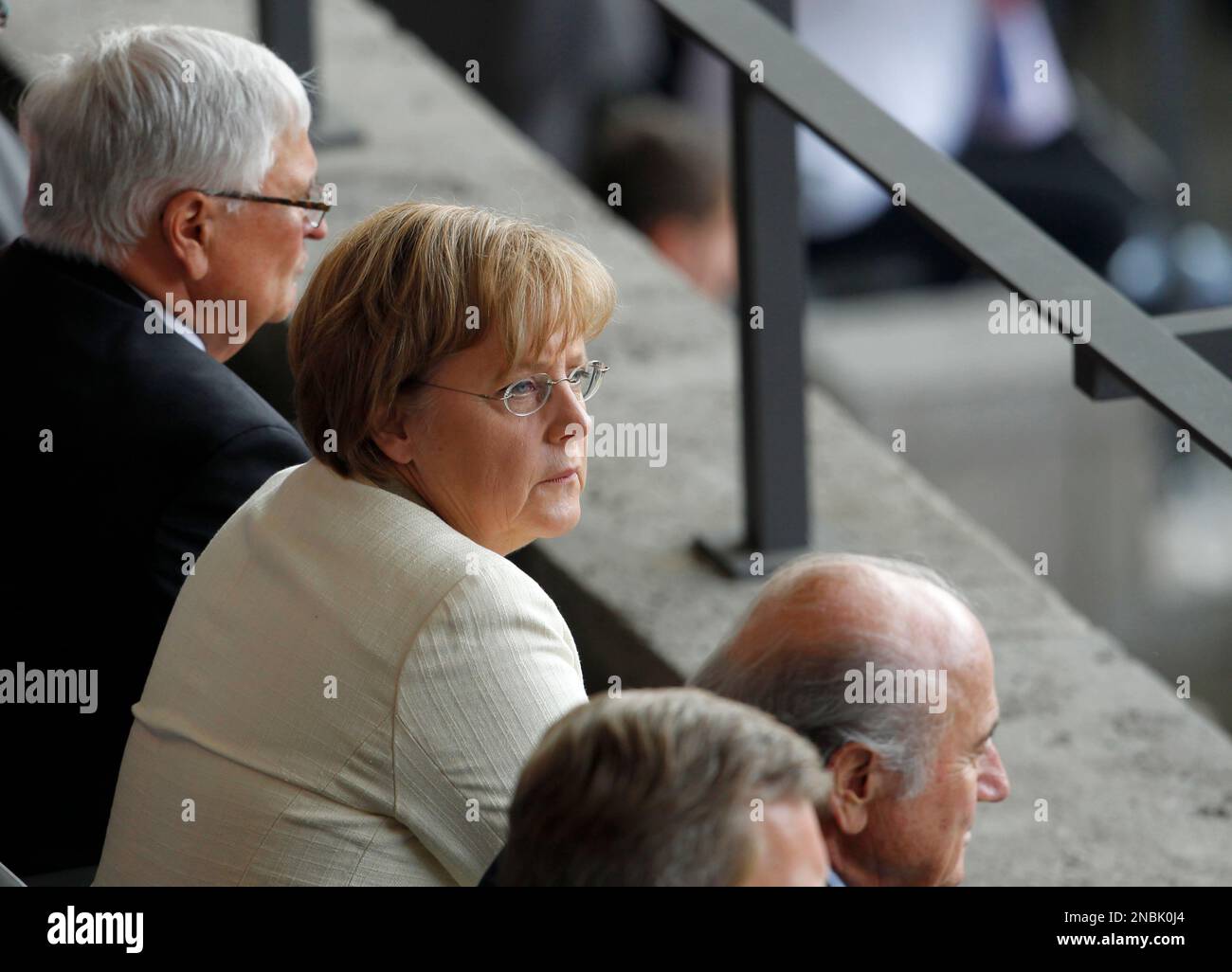 German Chancellor Angela Merkel is flanked by FIFA President Joseph ...