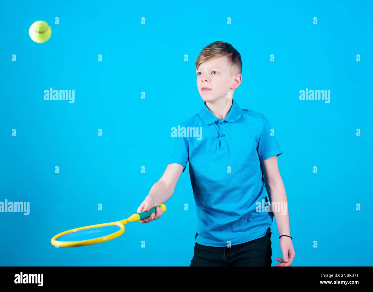 Tennis is fun. Gym workout of teen boy. Little boy. Fitness diet brings ...