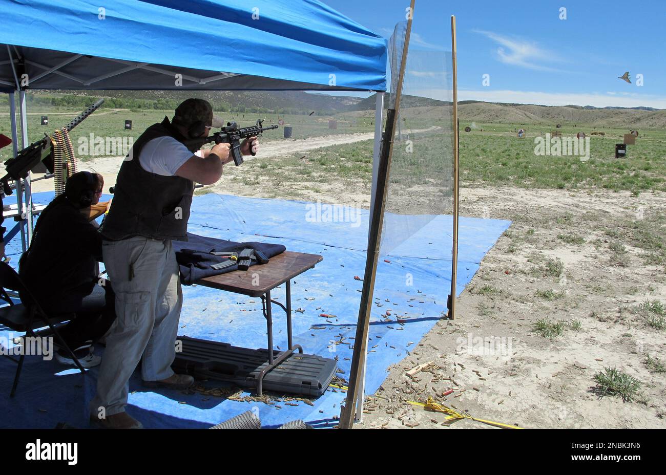 This June 3, 2011 photo shows Quinton Miller of Casper, Wyo., trying to ...