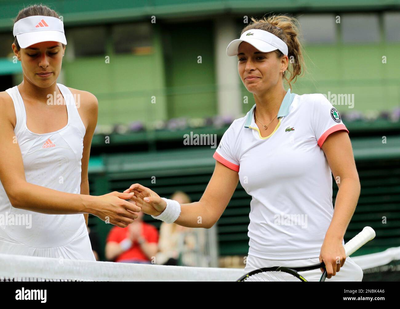 Petra Cetkovska of the Czech Republic, right, shakes hands after ...