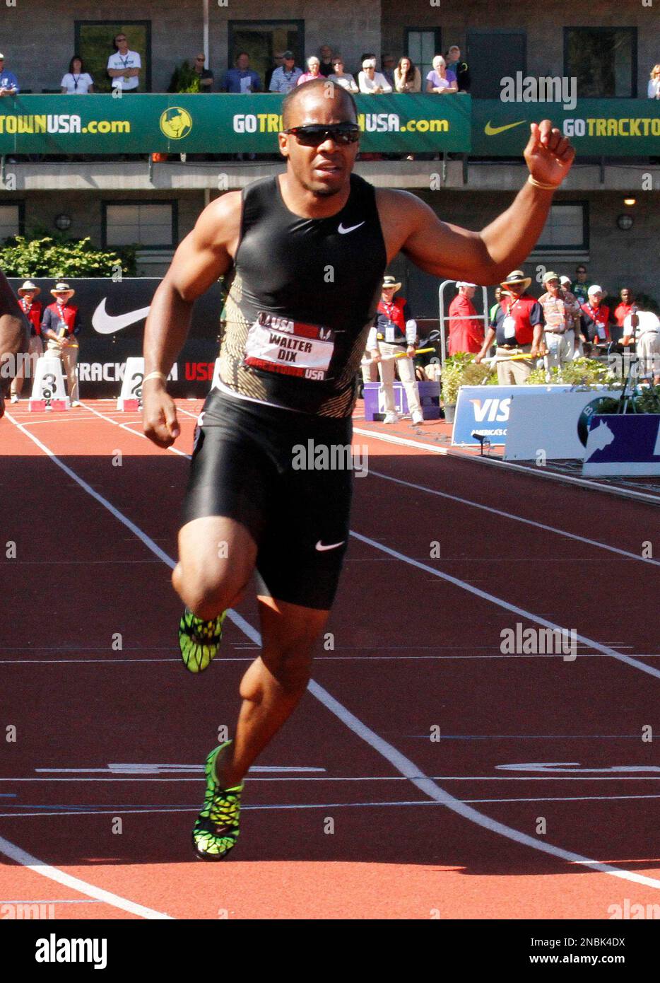 Sprinter Walter Dix runs a preliminary heat of the 100 meter race ...