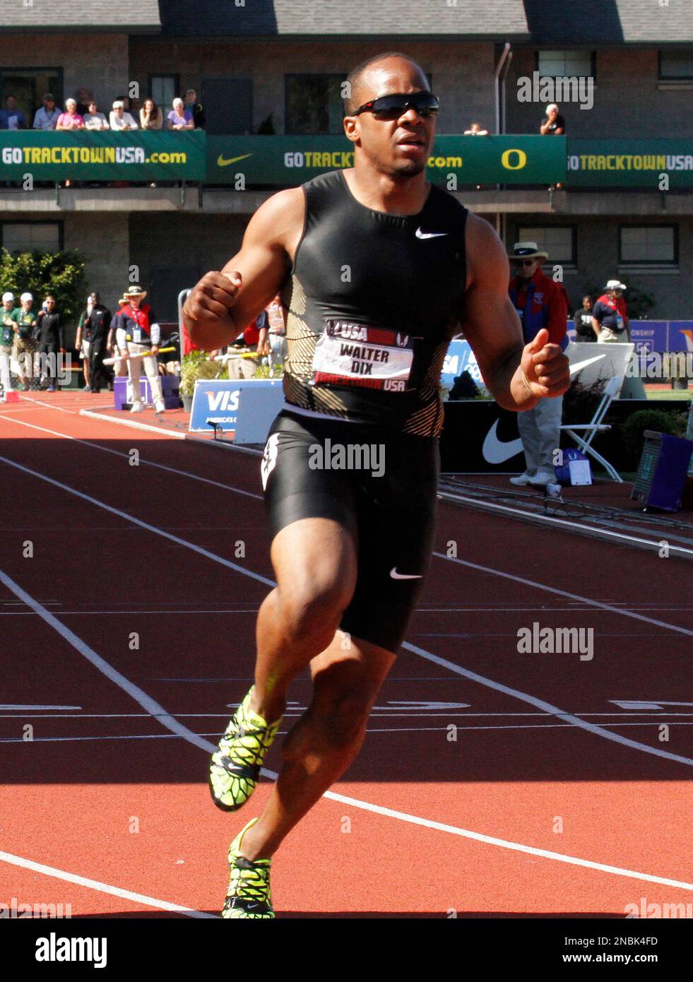 Sprinter Walter Dix runs a preliminary heat of the 100 meter race ...