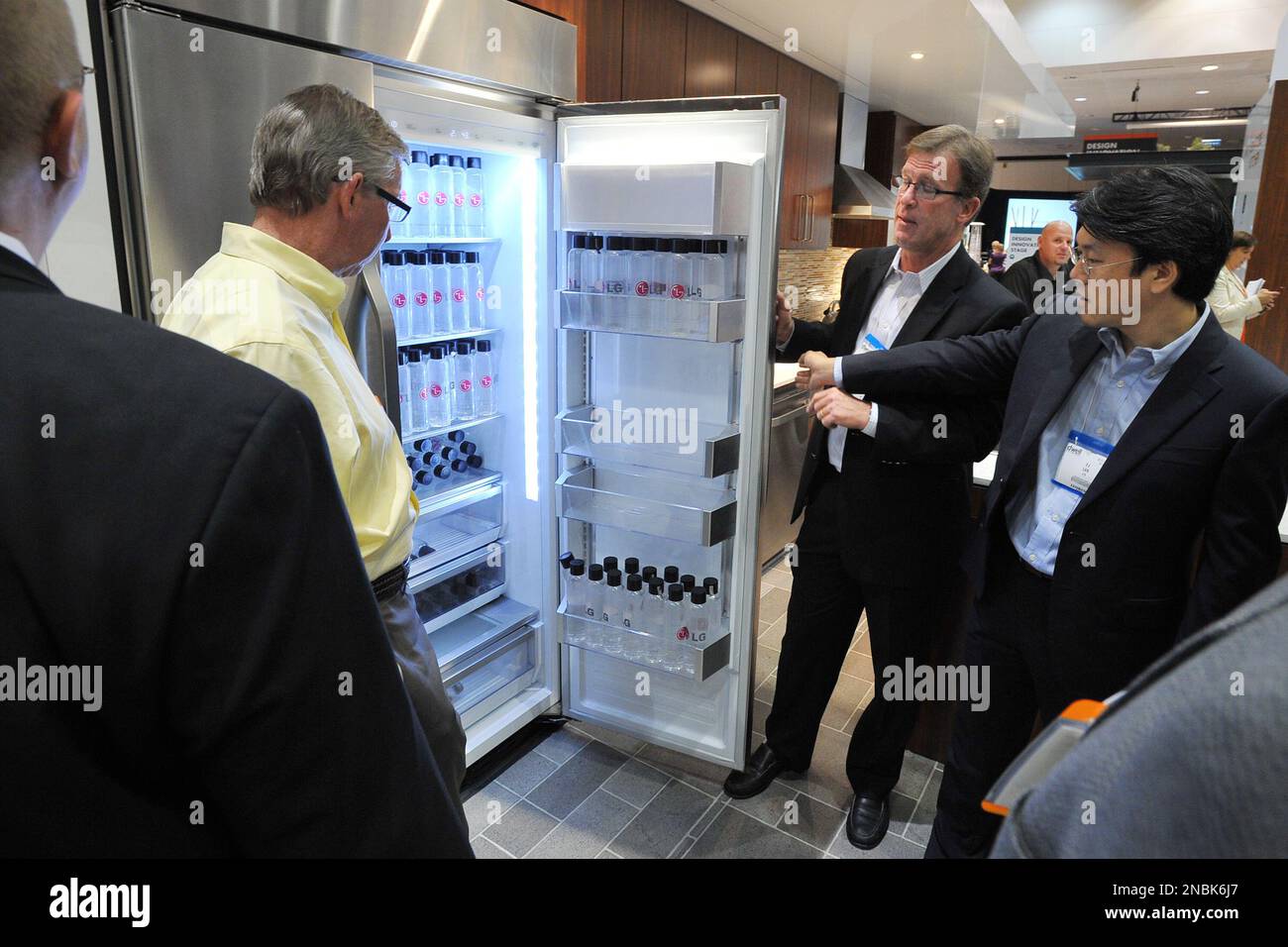 An LG Electronics representative demonstrates the LG Studio Series ...